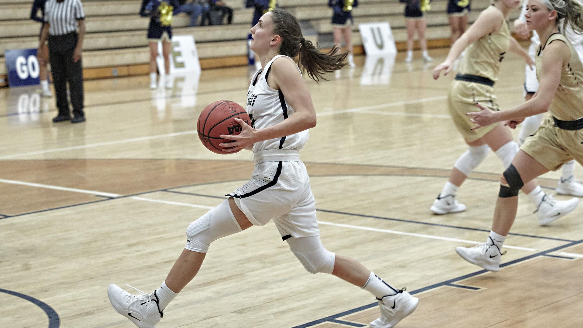 Buzzer-beater stops upset bid in Battle of the Saints - St. Edward's ...