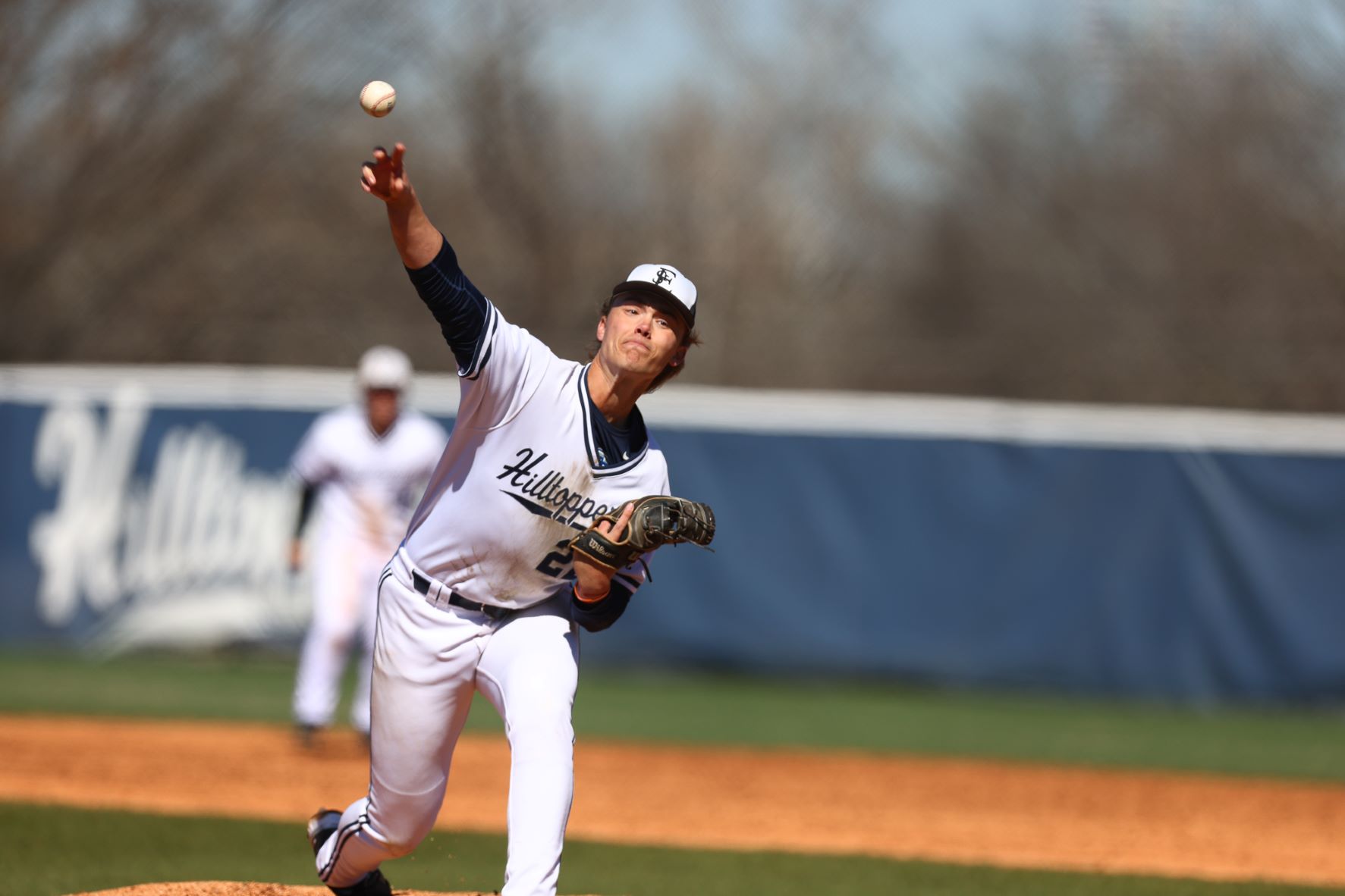 Hilltoppers split season-opening doubleheader - St. Edward's University ...