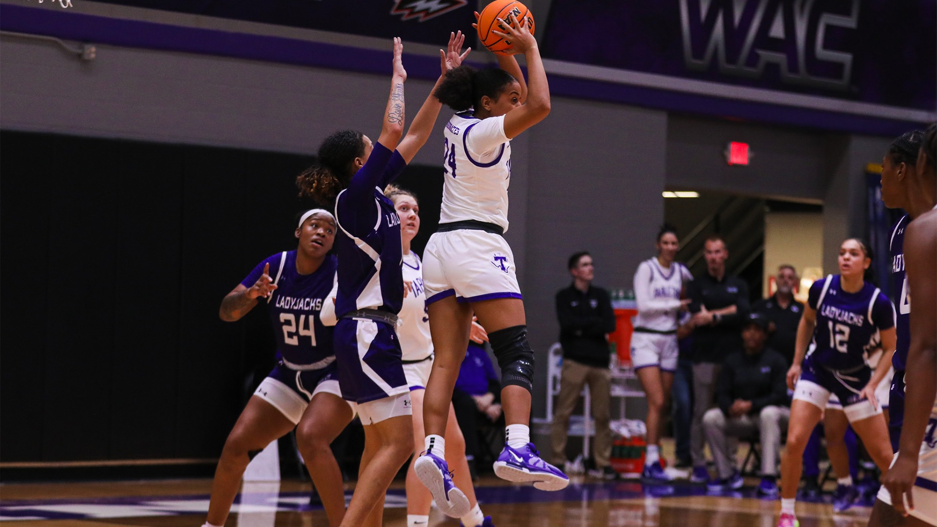 Fourth quarter slips away for Texans in WAC opener against Ladyjacks ...