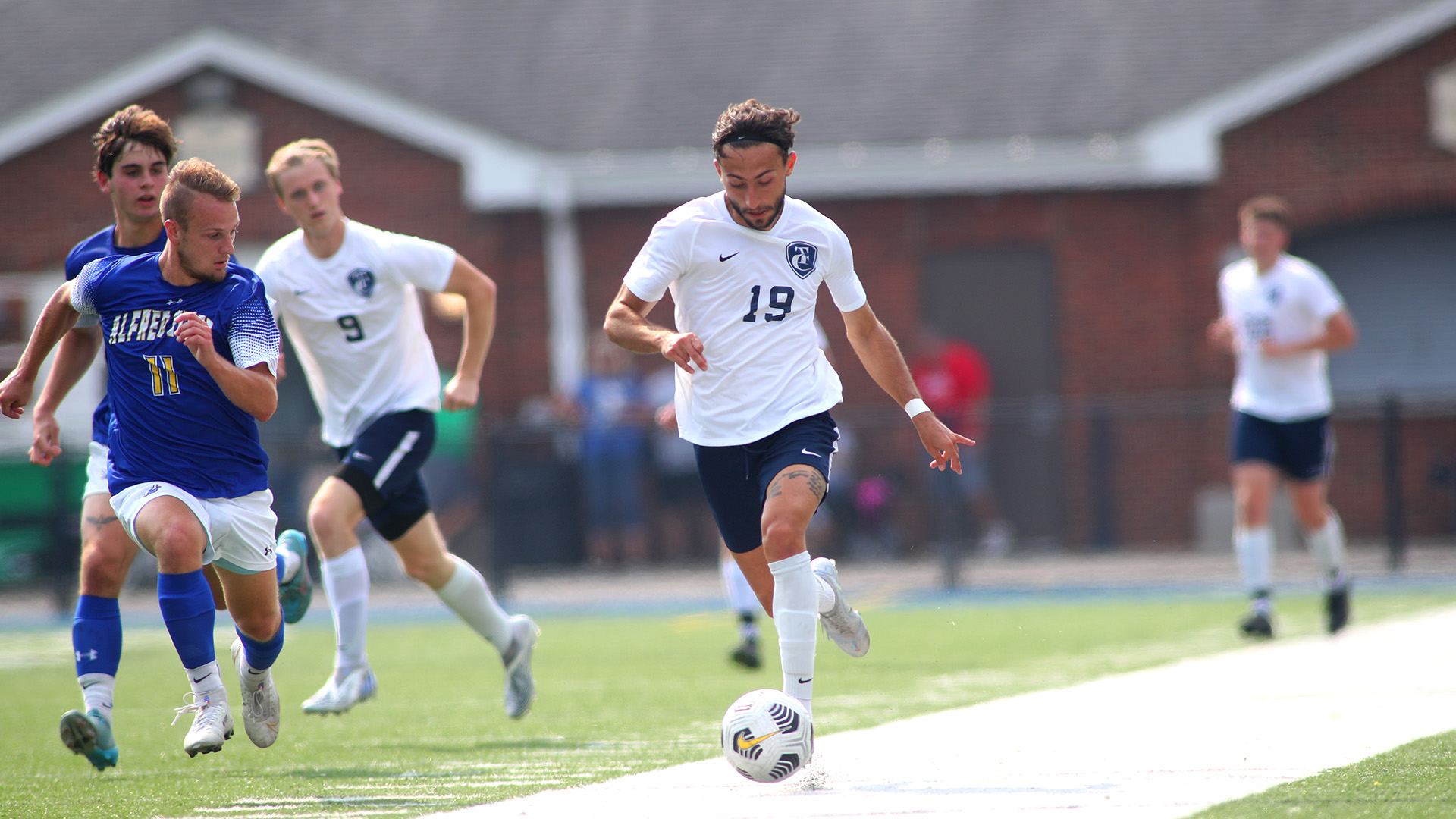 Tomcats edged by Barons in high scoring game - Thiel College Athletics