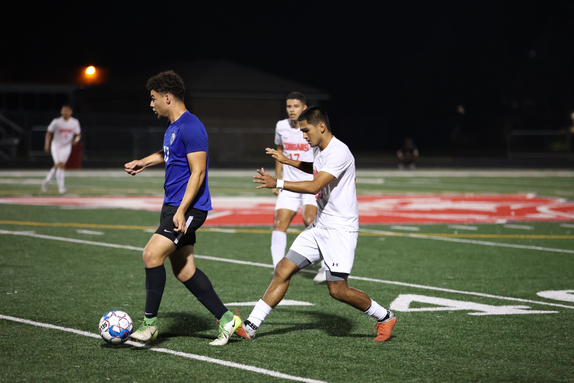 Trojans open CCAC play with victory over the Cougars - Trinity ...