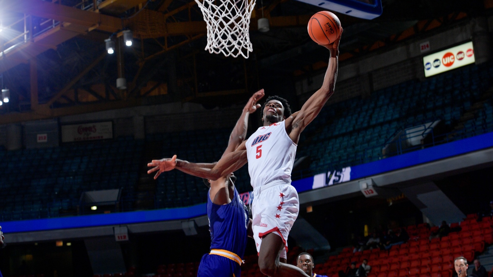 Toby Okani - Men's Basketball - UIC Athletics