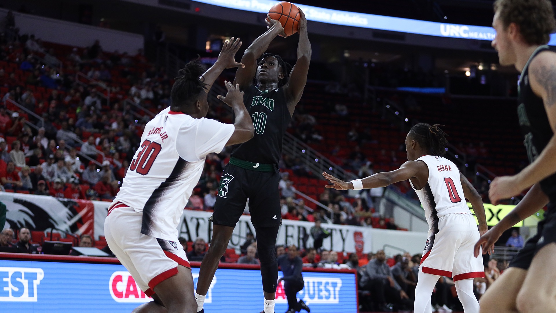 Trojans battle in loss at NC State, 89-79 - University of Mount Olive