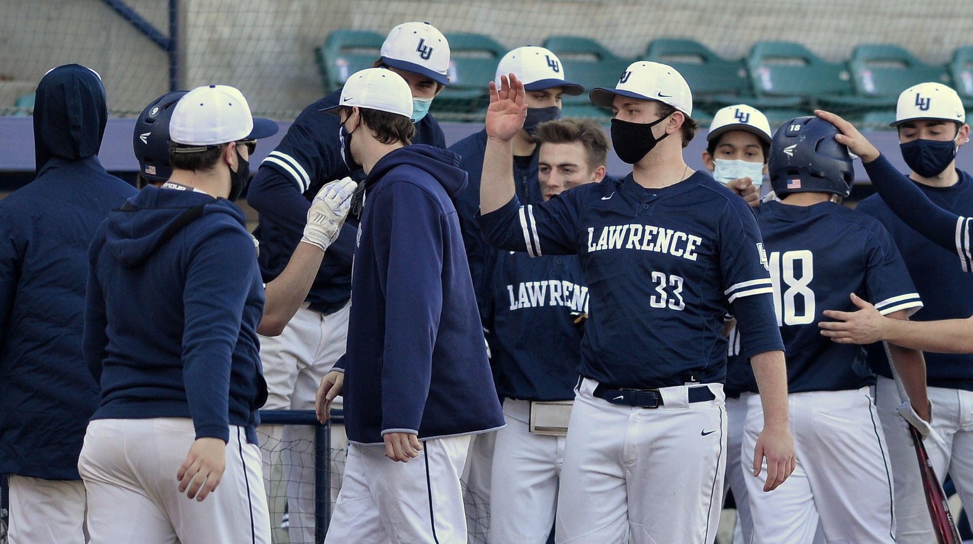 Limited amount of Lawrence fans to be allowed at spring events ...