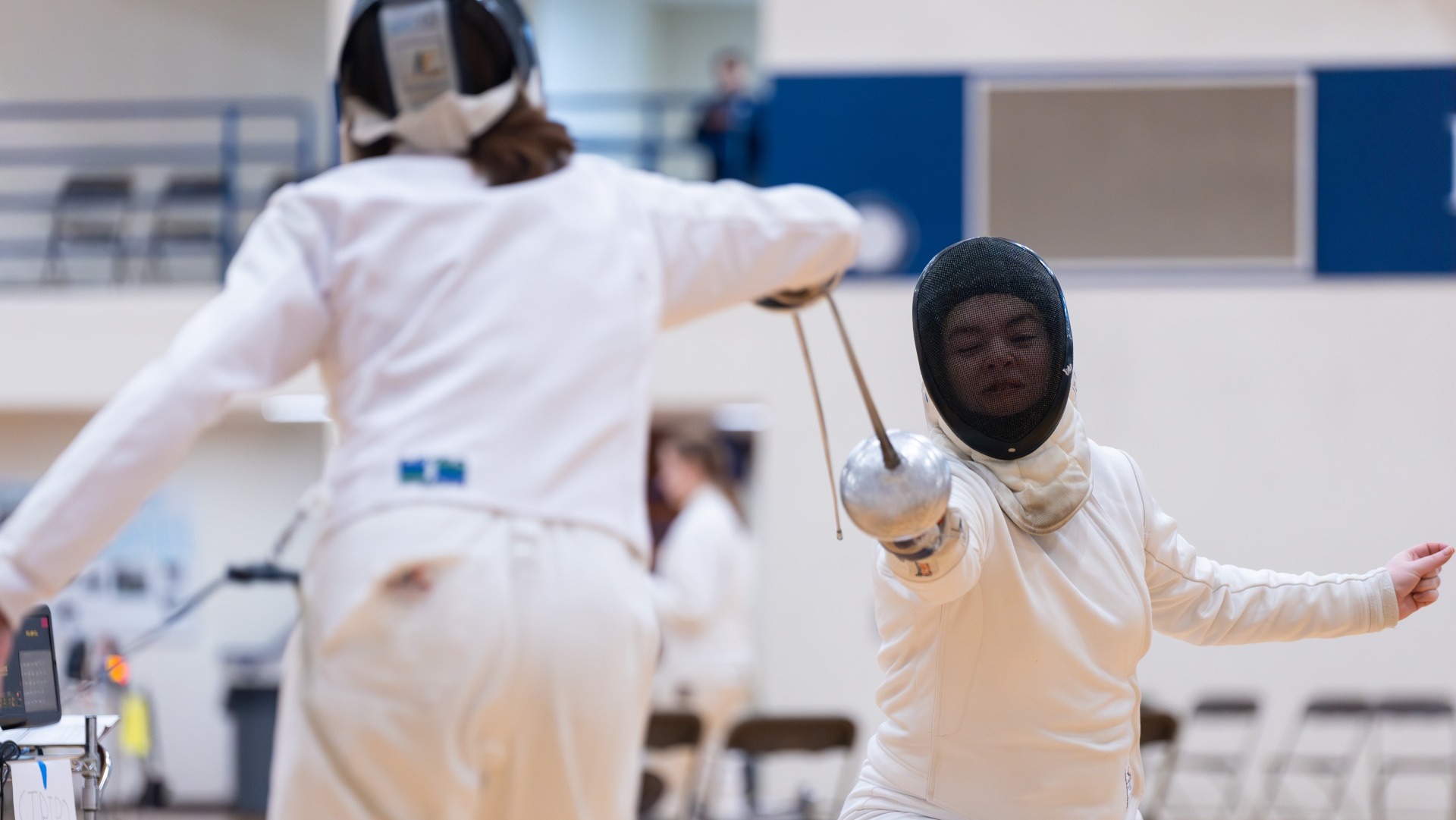 Lawrence men, women both collect three victories at DeCicco Duals ...