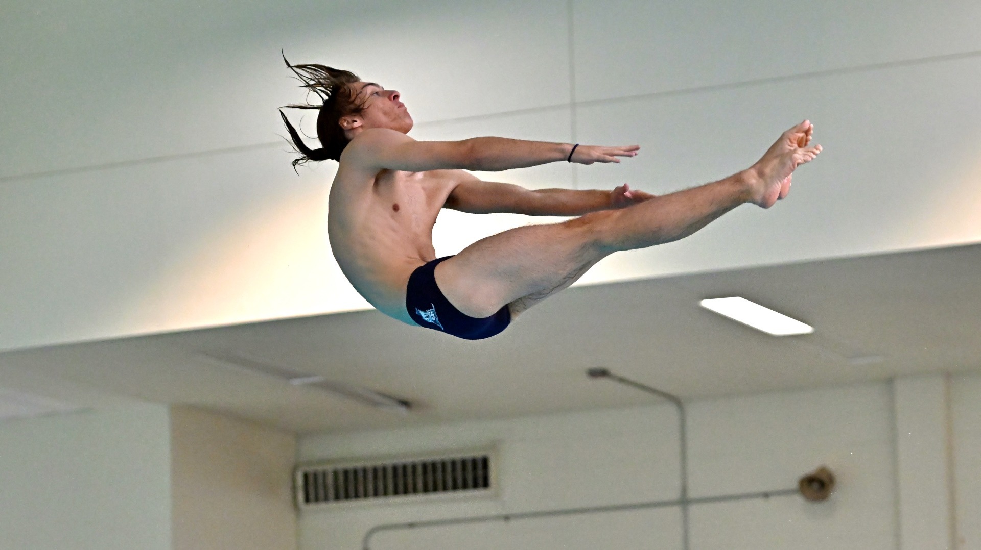 Bertman breaks school record on way to 1-meter diving title - Lawrence ...