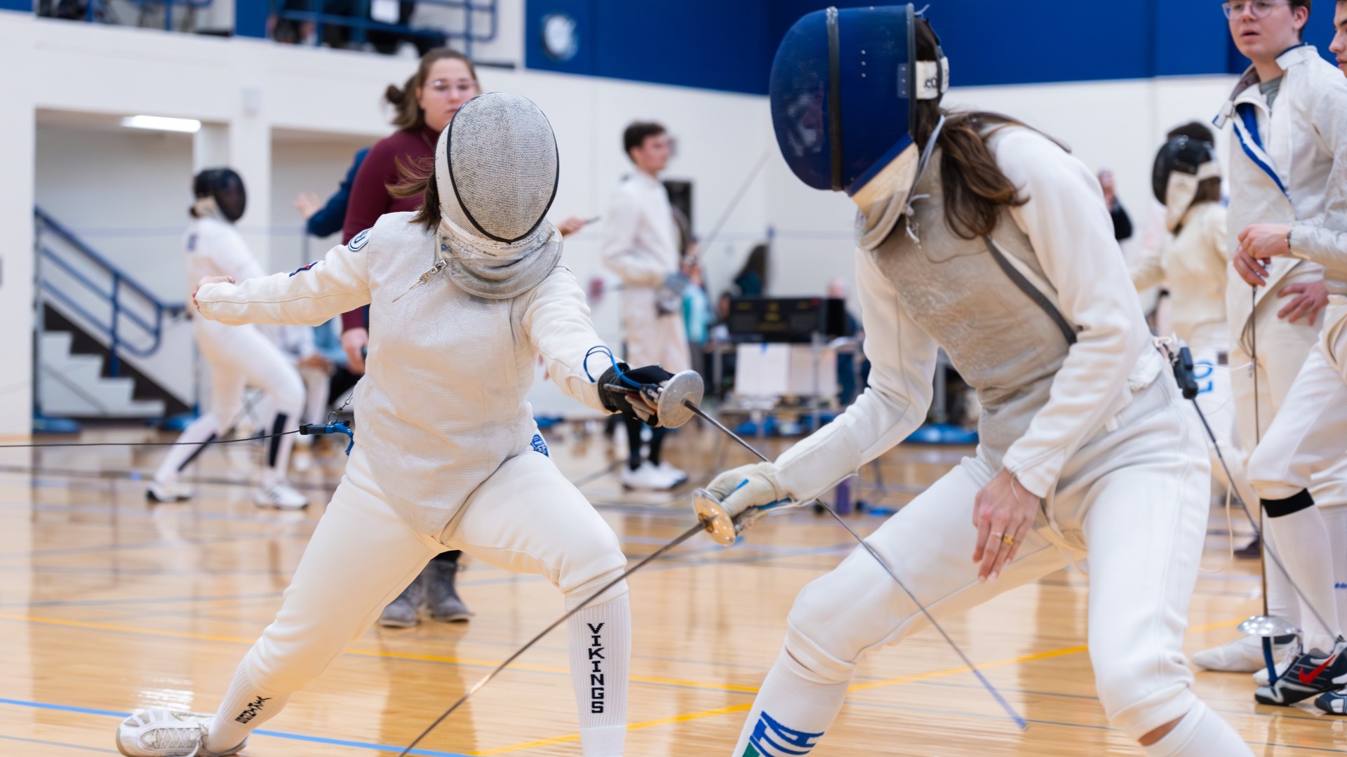 Both fencing teams pick up wins on final day of Northwestern Duals ...