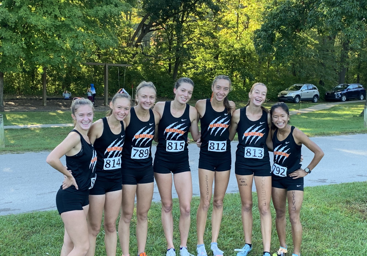 Girls Cross Country Stands Atop NLC Podium - Warsaw Community High School