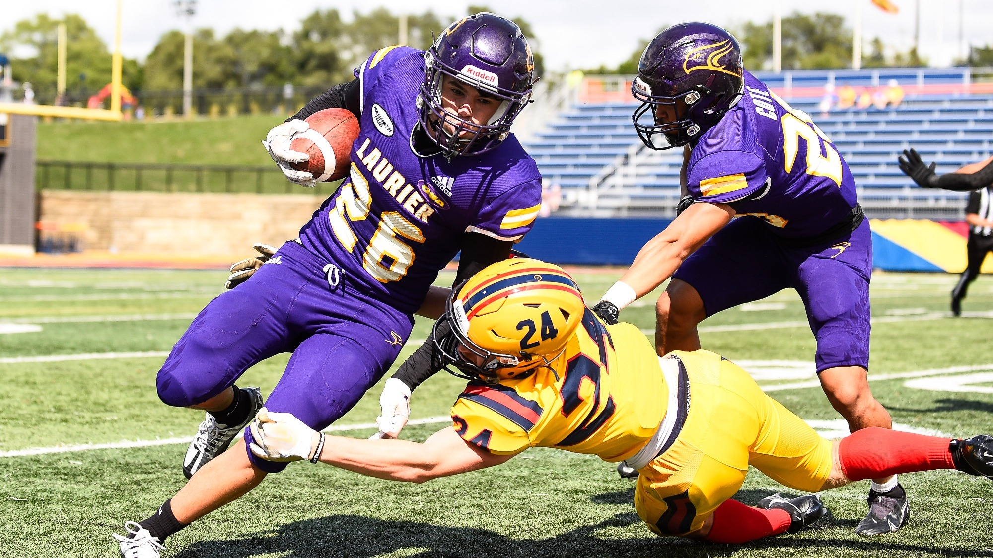 Rouge makes the difference in season-opening win over Queen's - Laurier ...