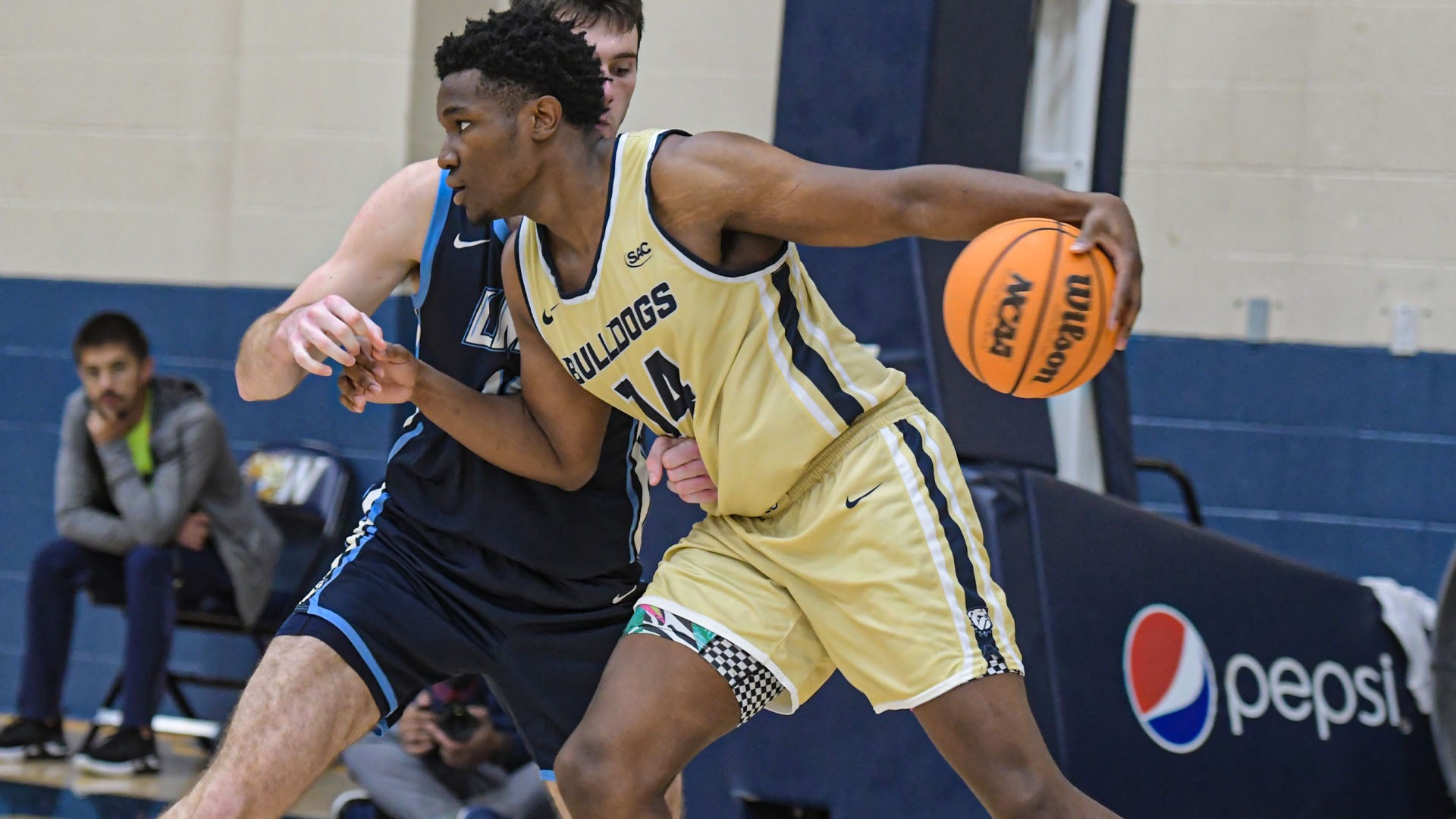 Massey and Taylor lead Bulldogs past #23 Lincoln Memorial - Wingate ...