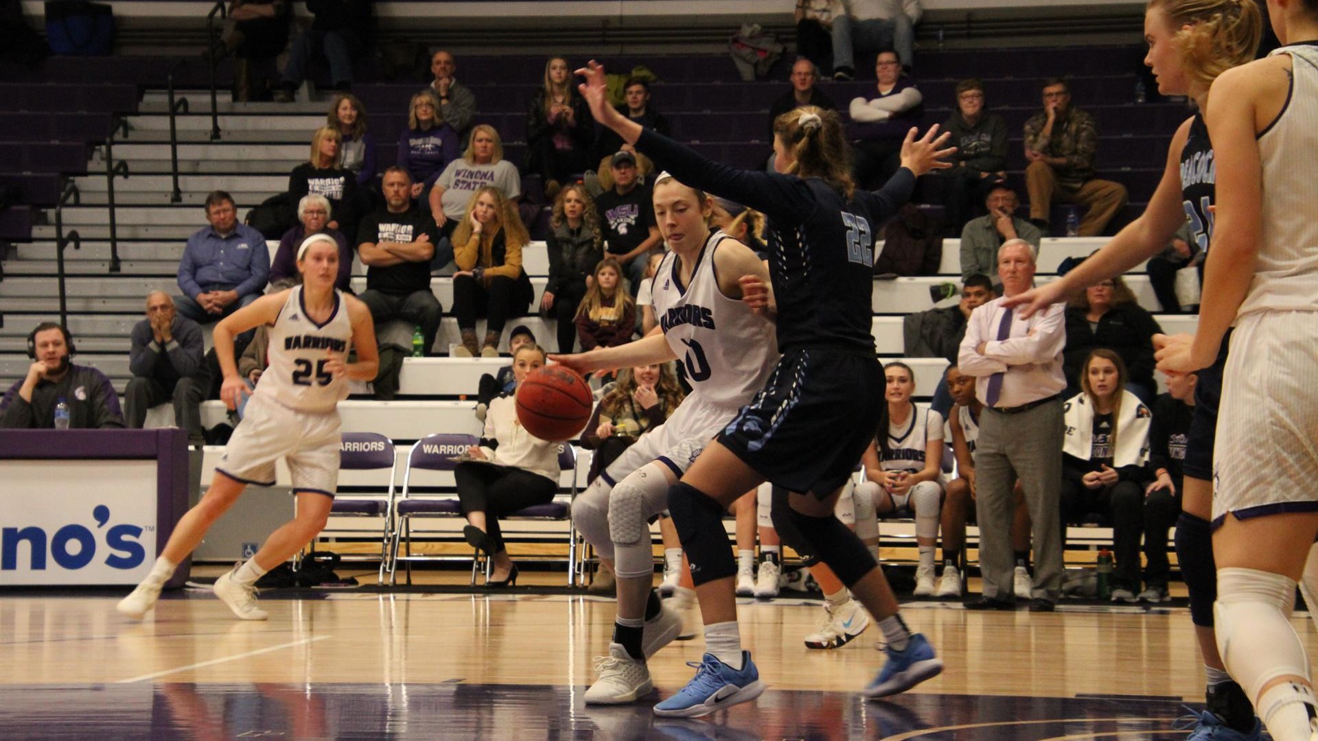 Warriors victorious in physical battle with Peacocks - Winona State ...