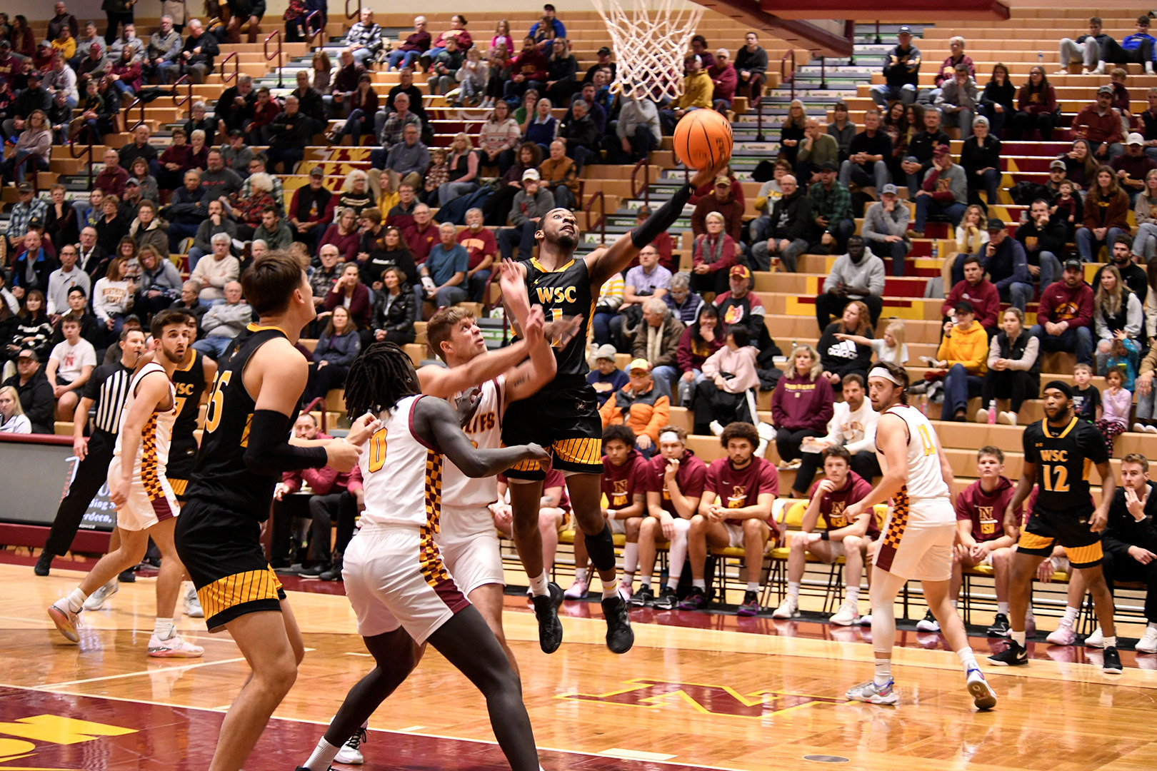 Millender's late jumper helps WSC withstand furious Northern State ...