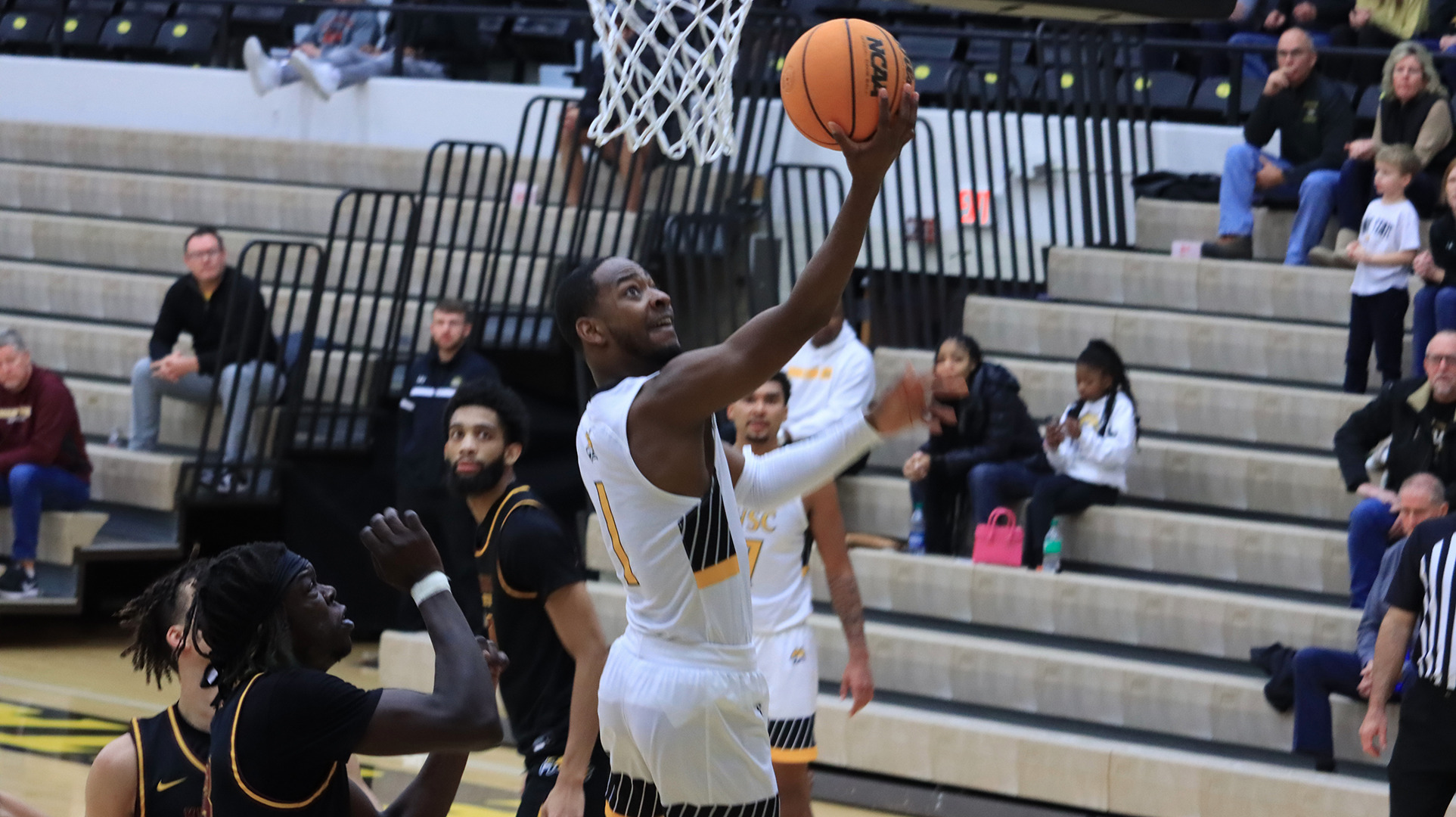 Millender leads Wildcats past Minnesota Crookston - Wayne State College ...