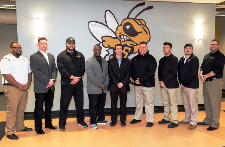 Football Staff Coming Together - West Virginia State University Athletics