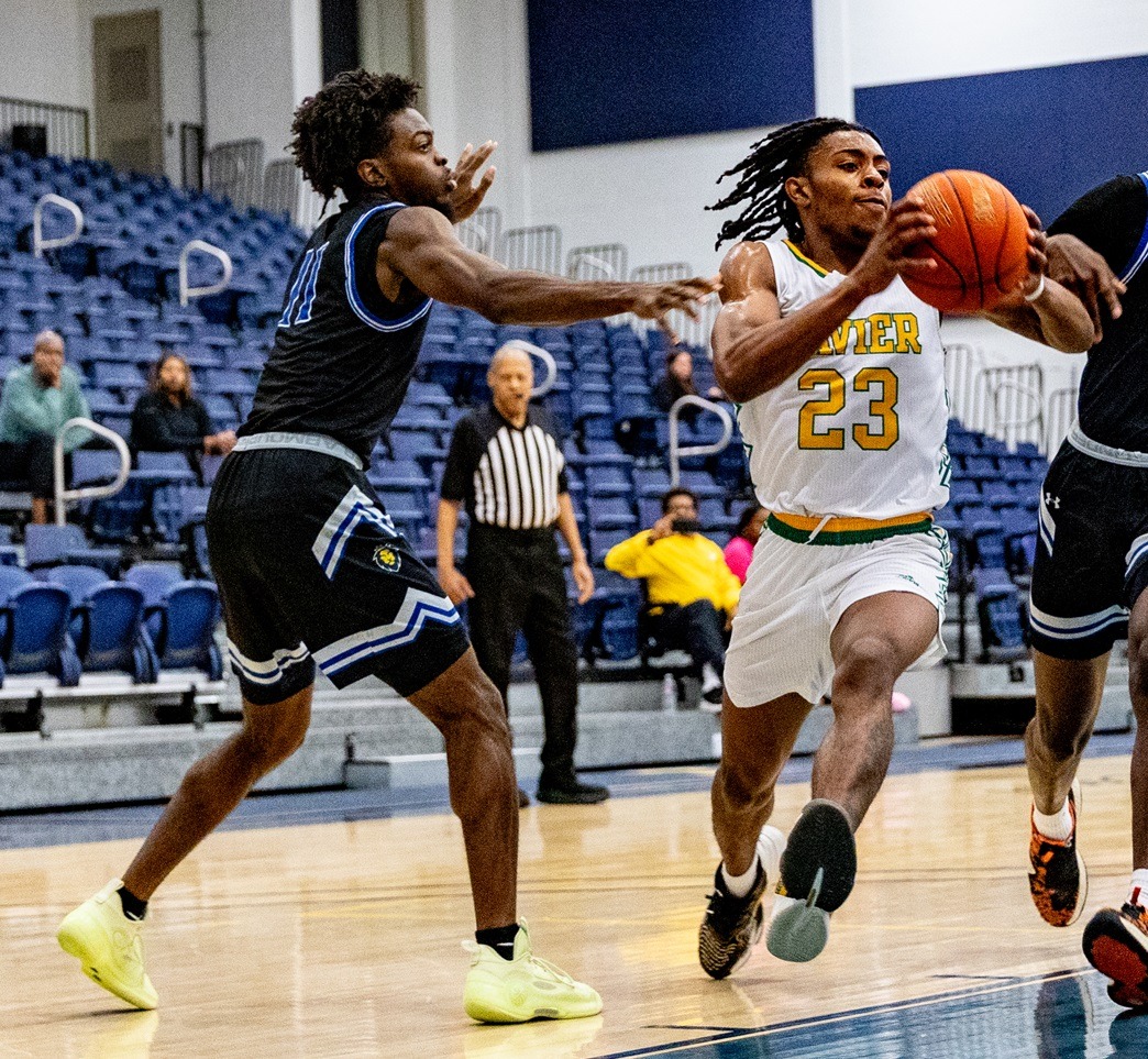 Red-hot 2nd half moves Gold Rush past Eagles - Xavier University of ...