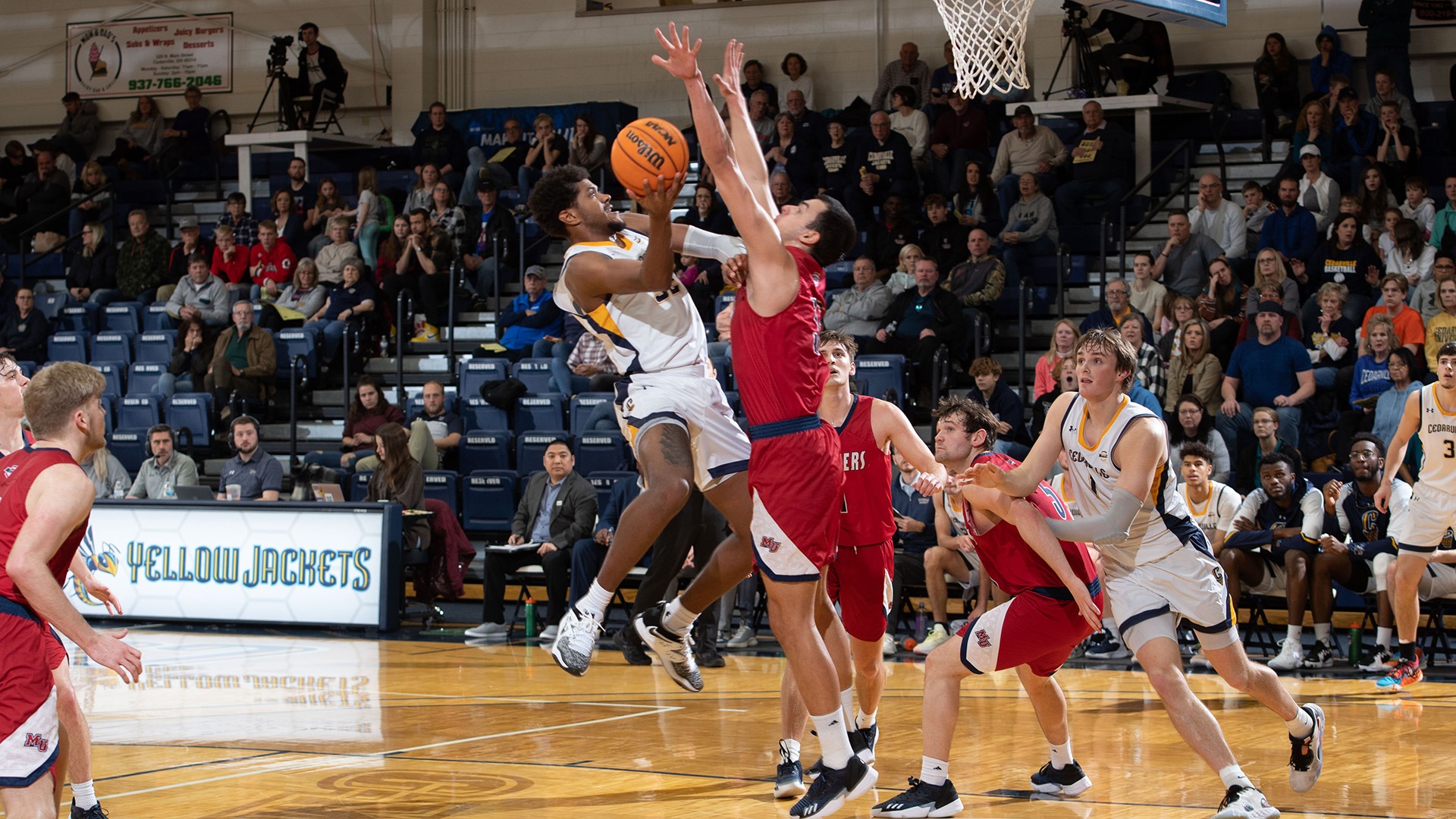 Bench sparks Yellow Jackets in win over Malone - Cedarville University ...
